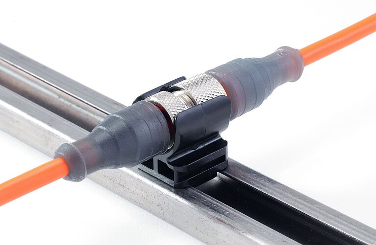 HEBOTEC: M12-connector clip for C11-rails